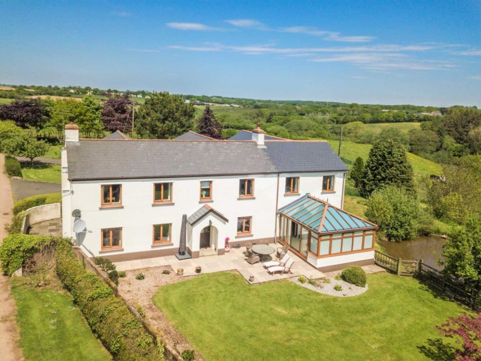 Discover the Devon farmhouse with an aircraft runway