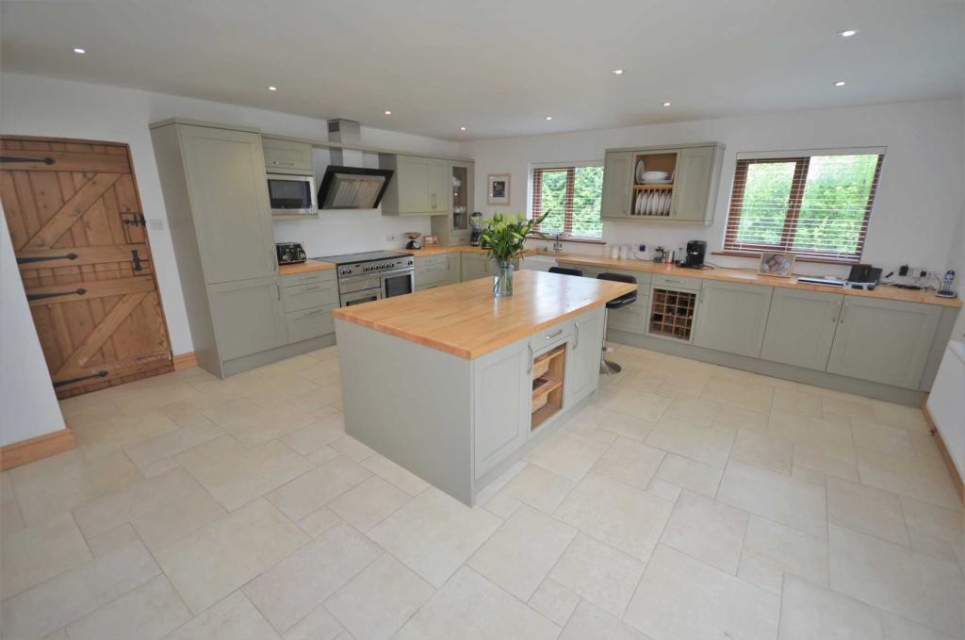 Discover the Devon farmhouse with an aircraft runway