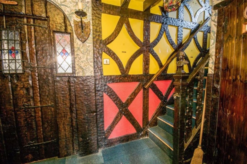 Peek inside the modern day castle with its own mini moat