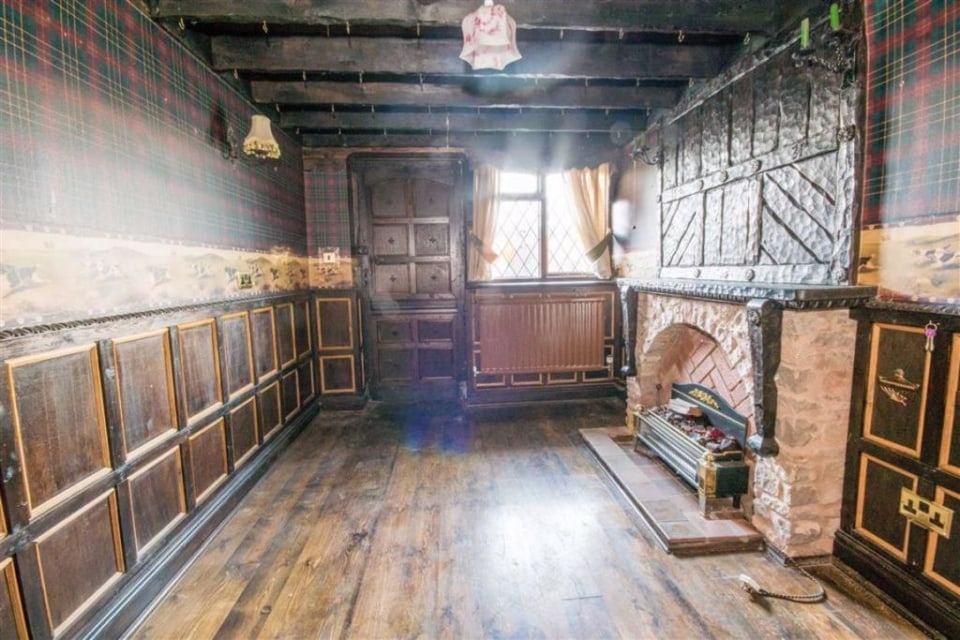 Peek inside the modern day castle with its own mini moat