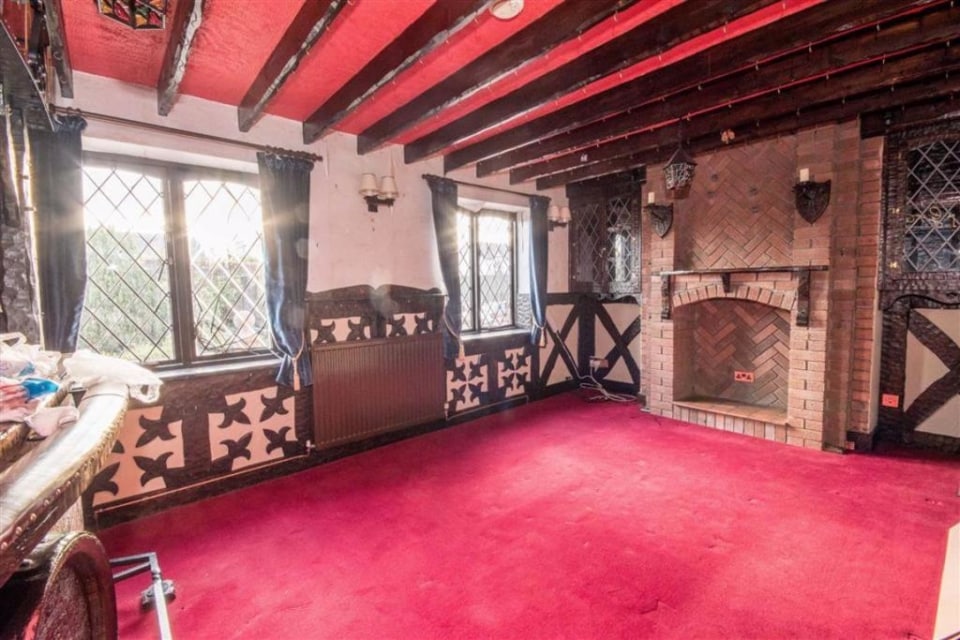 Peek inside the modern day castle with its own mini moat